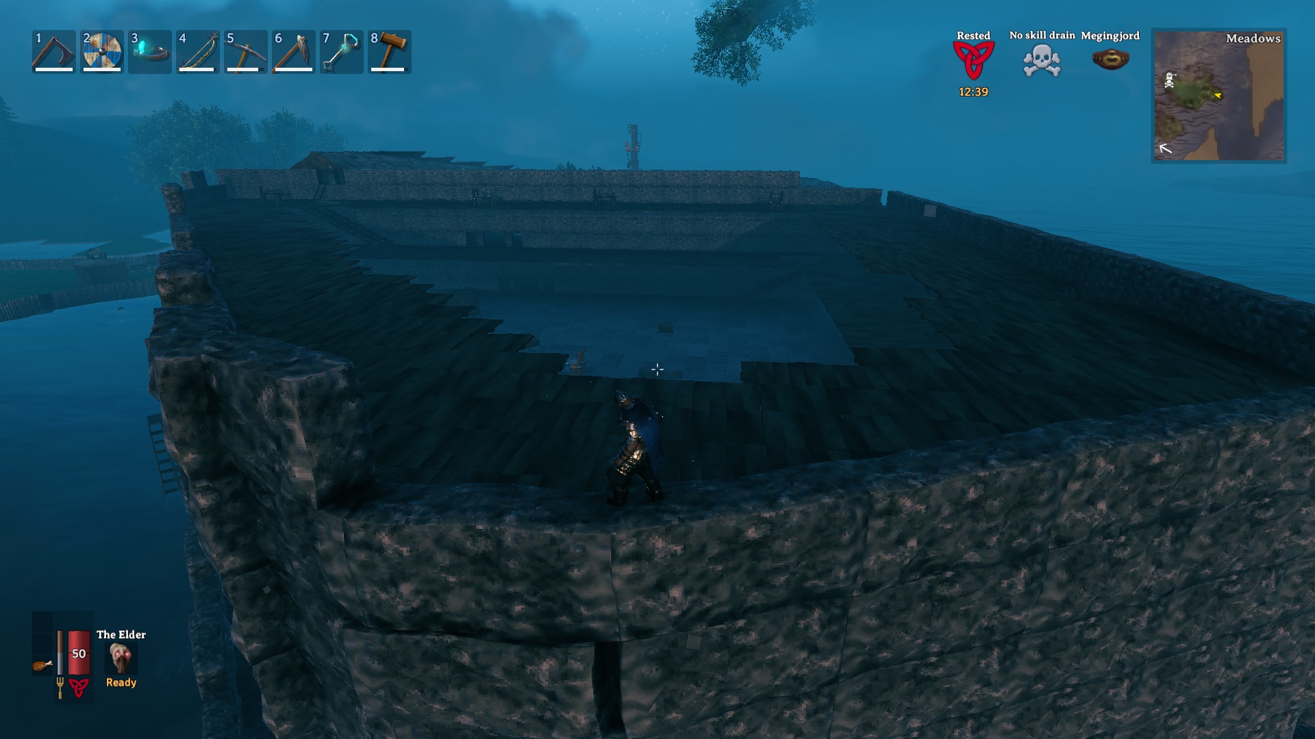 you can build 15 block high stone wall if you reinforce it with wood ...