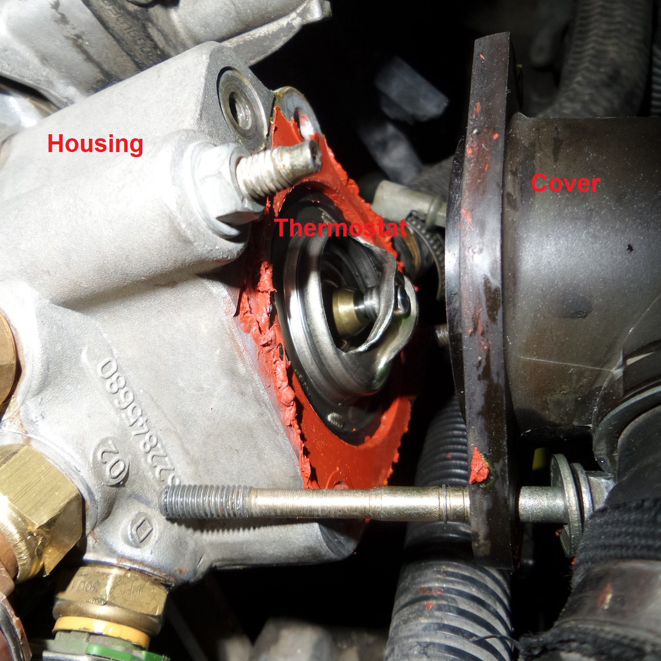 How can I open my thermostat cover which is stuck due to using too much ...